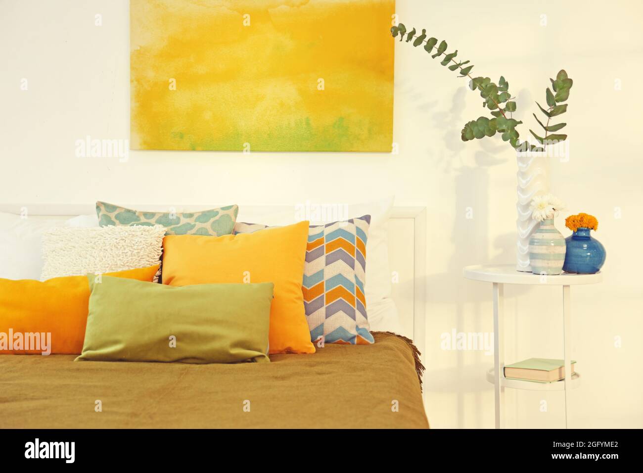 Color interior of modern bedroom with cozy double bed Stock Photo - Alamy