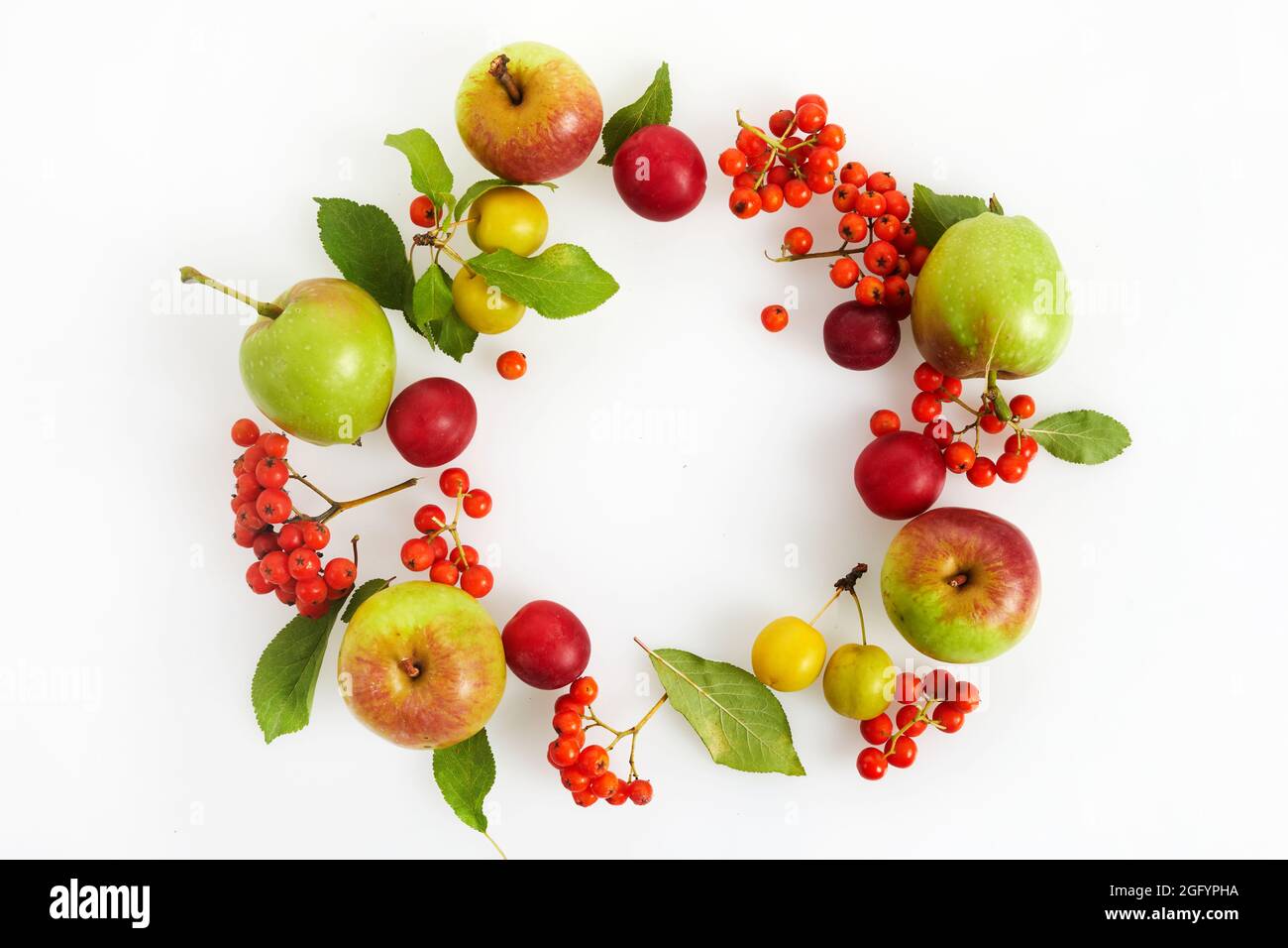 Round frame with Autumn yellow, orange and red vegetables and fruits on ...