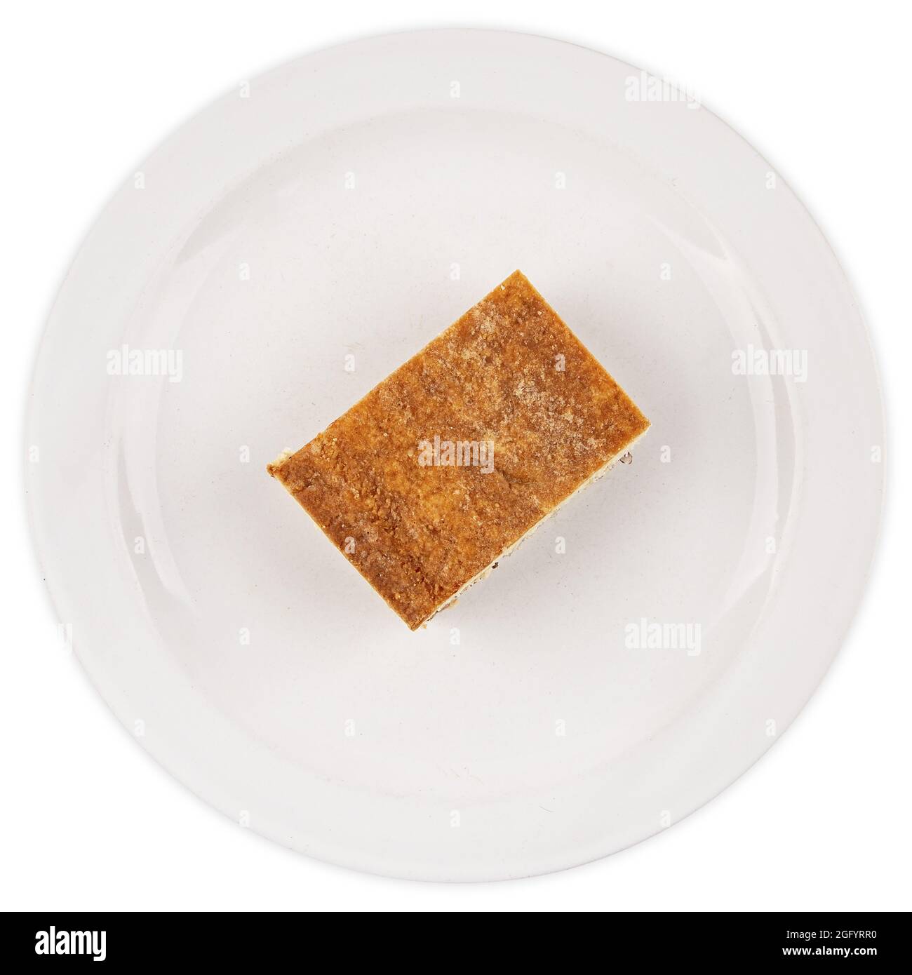 Overhead shot of a slice of graham cake isolated on white background ...
