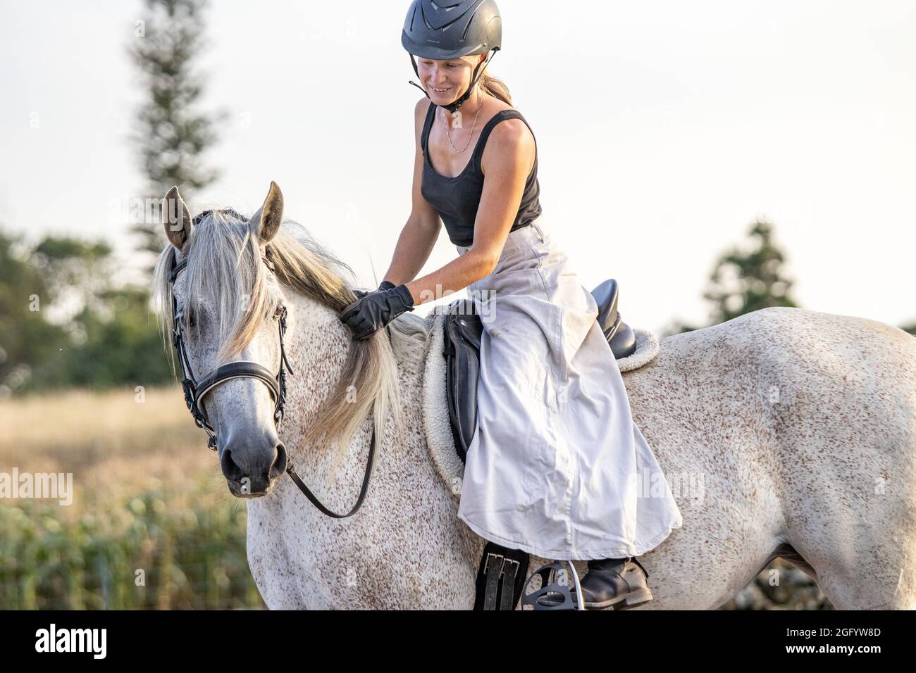 Female white horse rider hi-res stock photography and images - Alamy