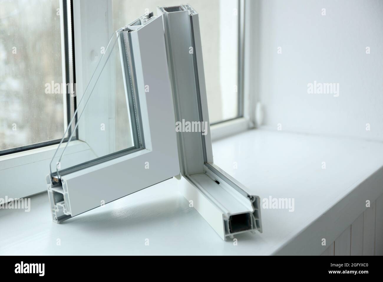 Sample of window profile on windowsill Stock Photo - Alamy
