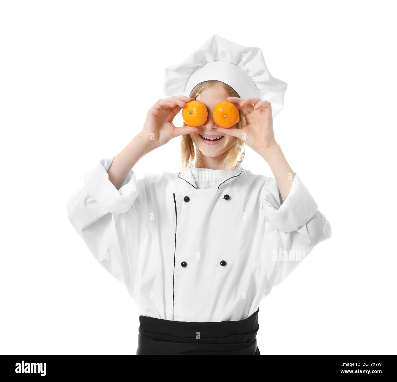Cute girl in chef uniform on white background Stock Photo - Alamy