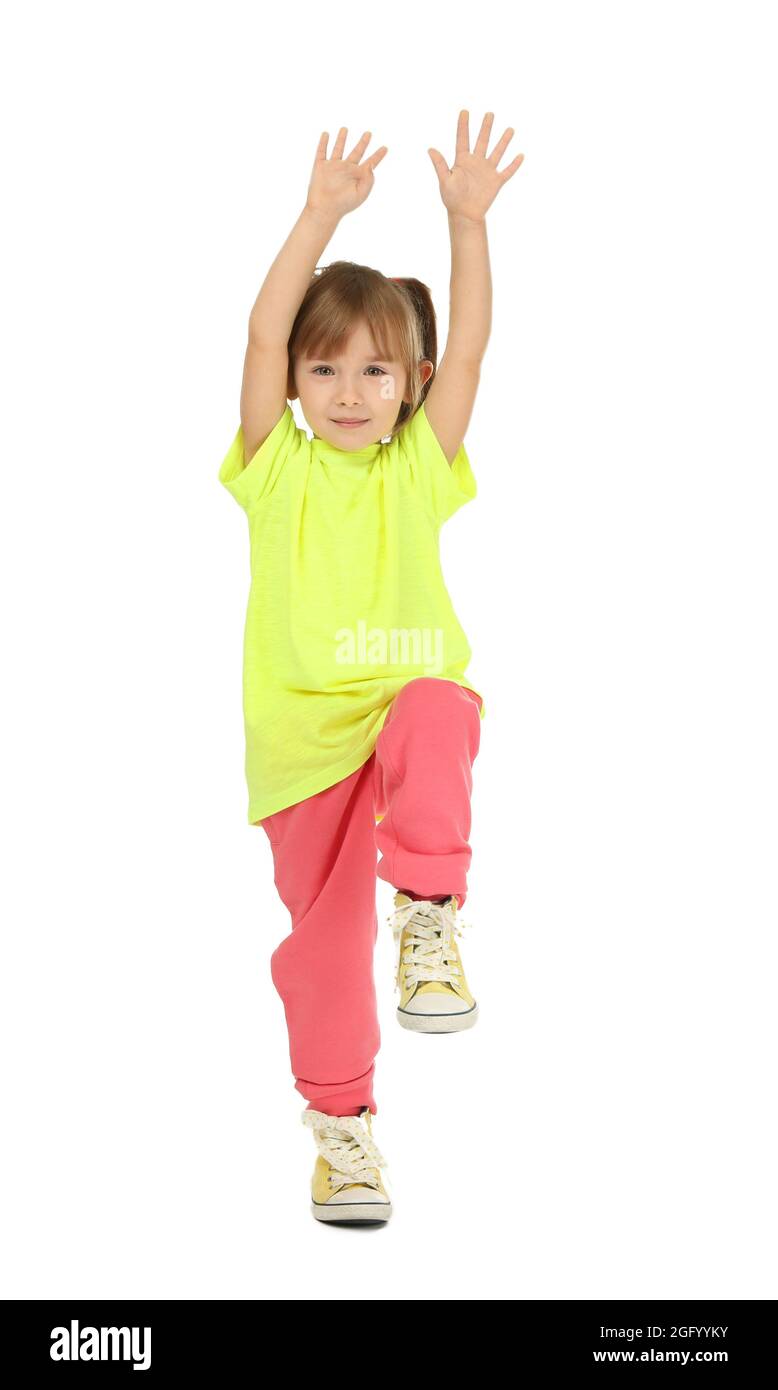 Cute funny girl dancing on white background Stock Photo - Alamy