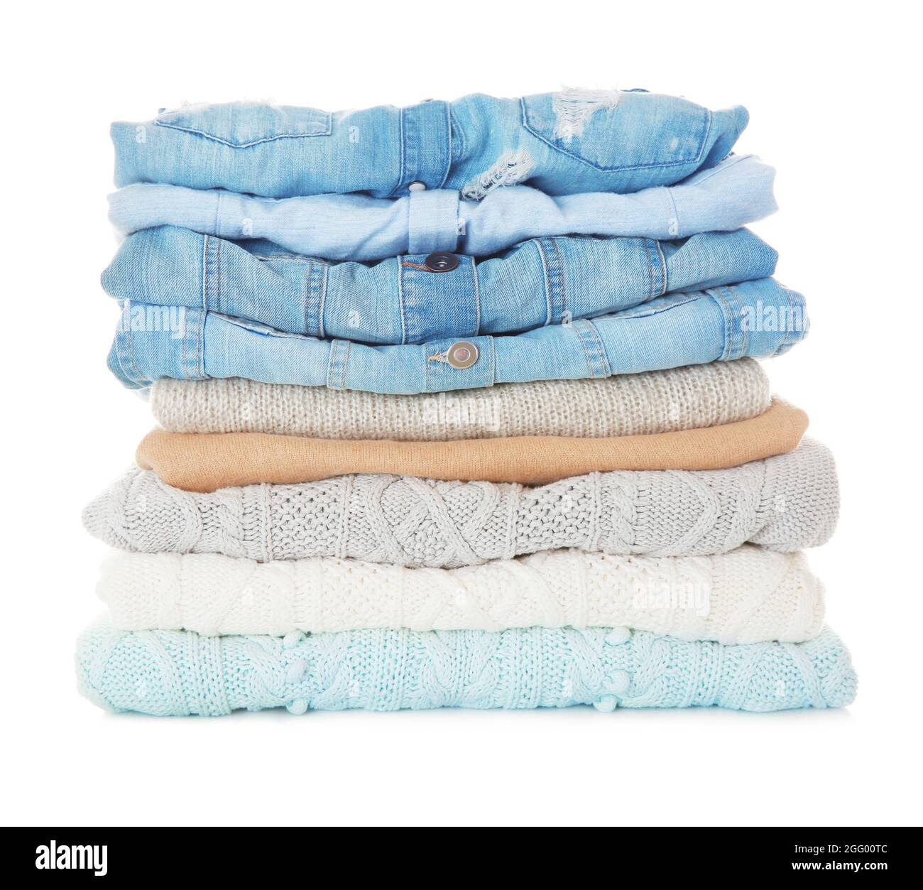 Stack of clothes on white background, closeup Stock Photo - Alamy