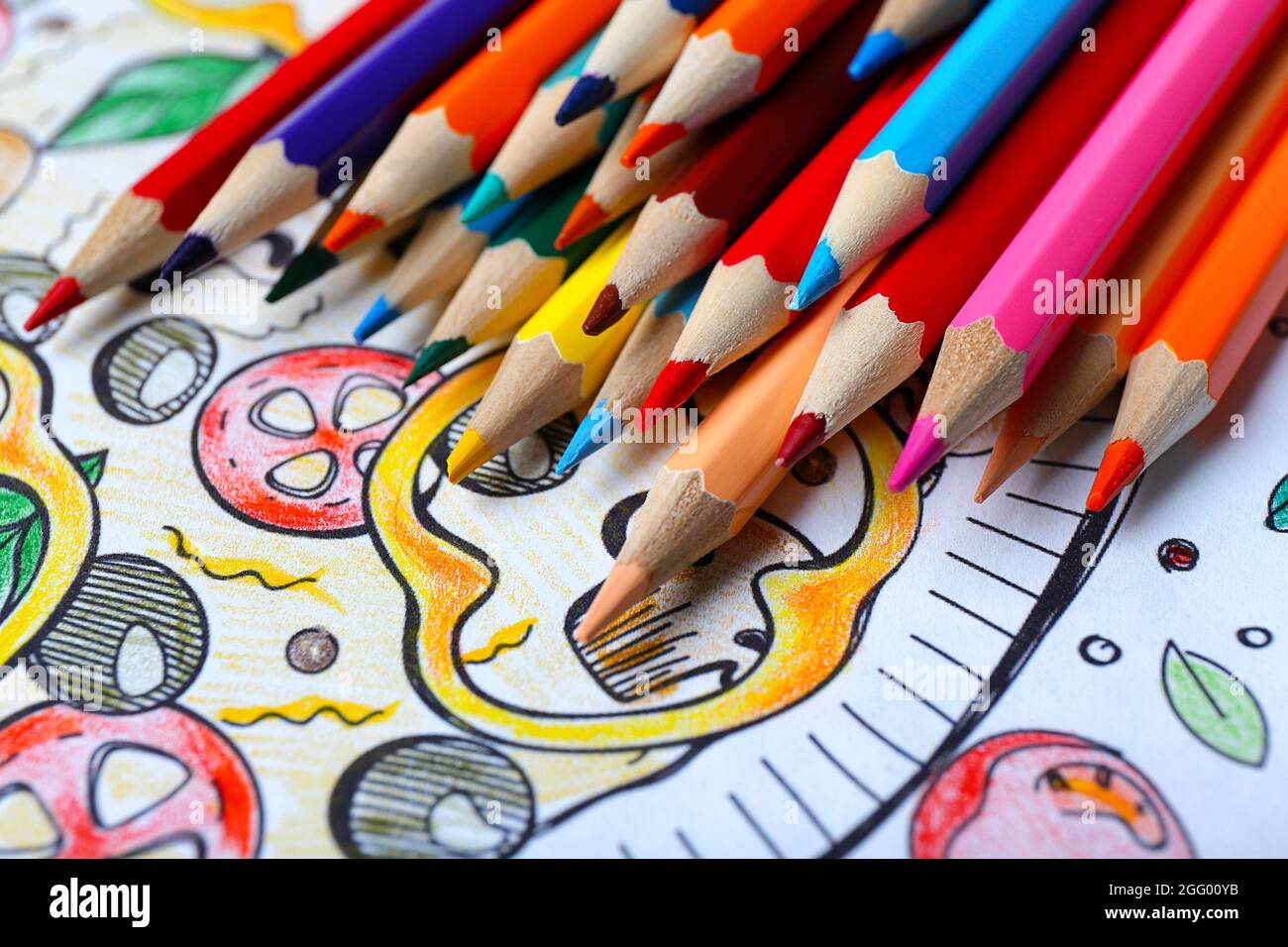 Colouring picture and pencils, closeup Stock Photo - Alamy