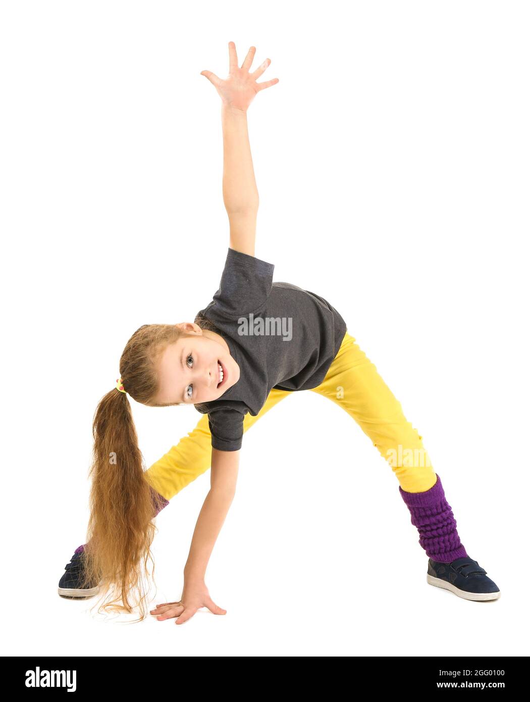 Cute funny girl dancing on white background Stock Photo - Alamy