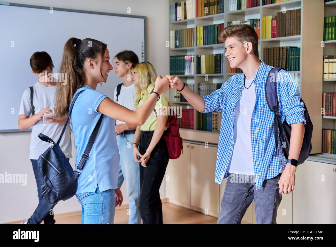 Group of teenagers guys and girls are welcome, meeting, smiling ...