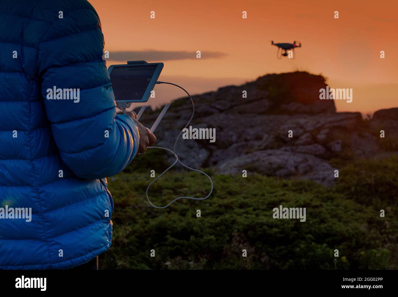 Sunset flying quadcopter drone scanning hi-res stock photography and ...