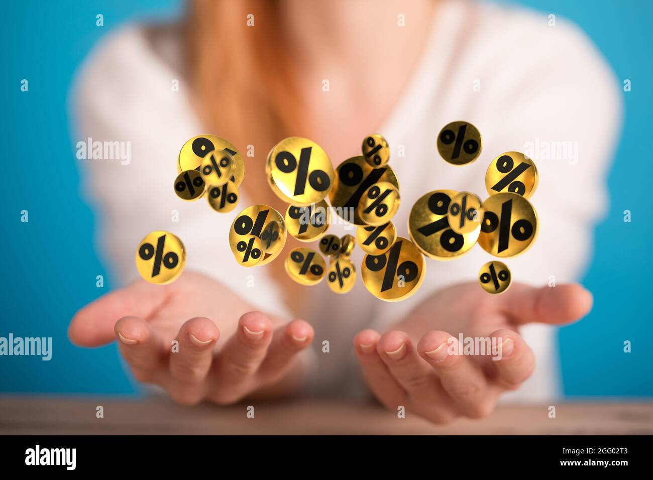 Hand holding 3D percent signs in the air Stock Photo - Alamy