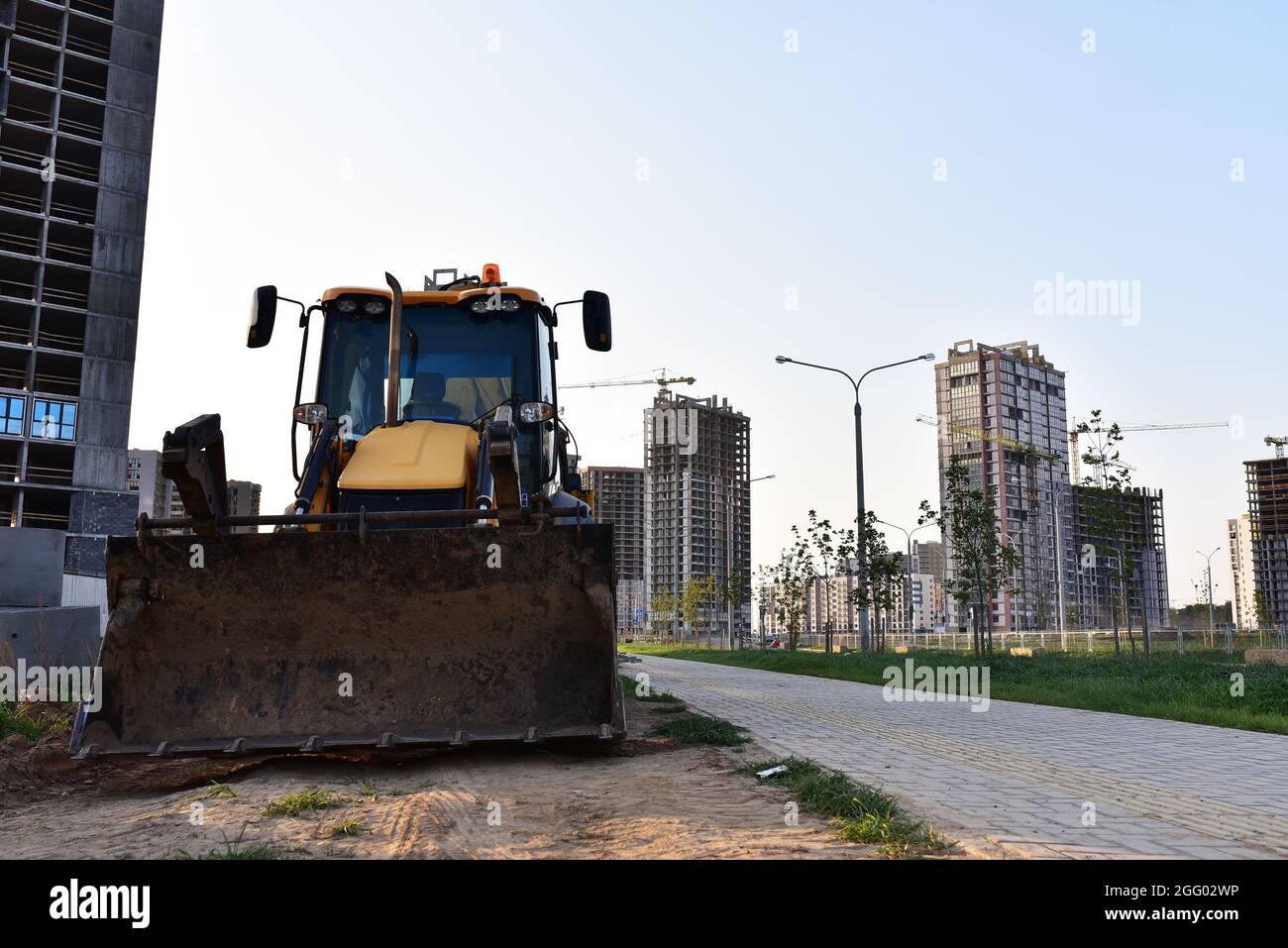 Tractor during excavation and road construction works at construction ...