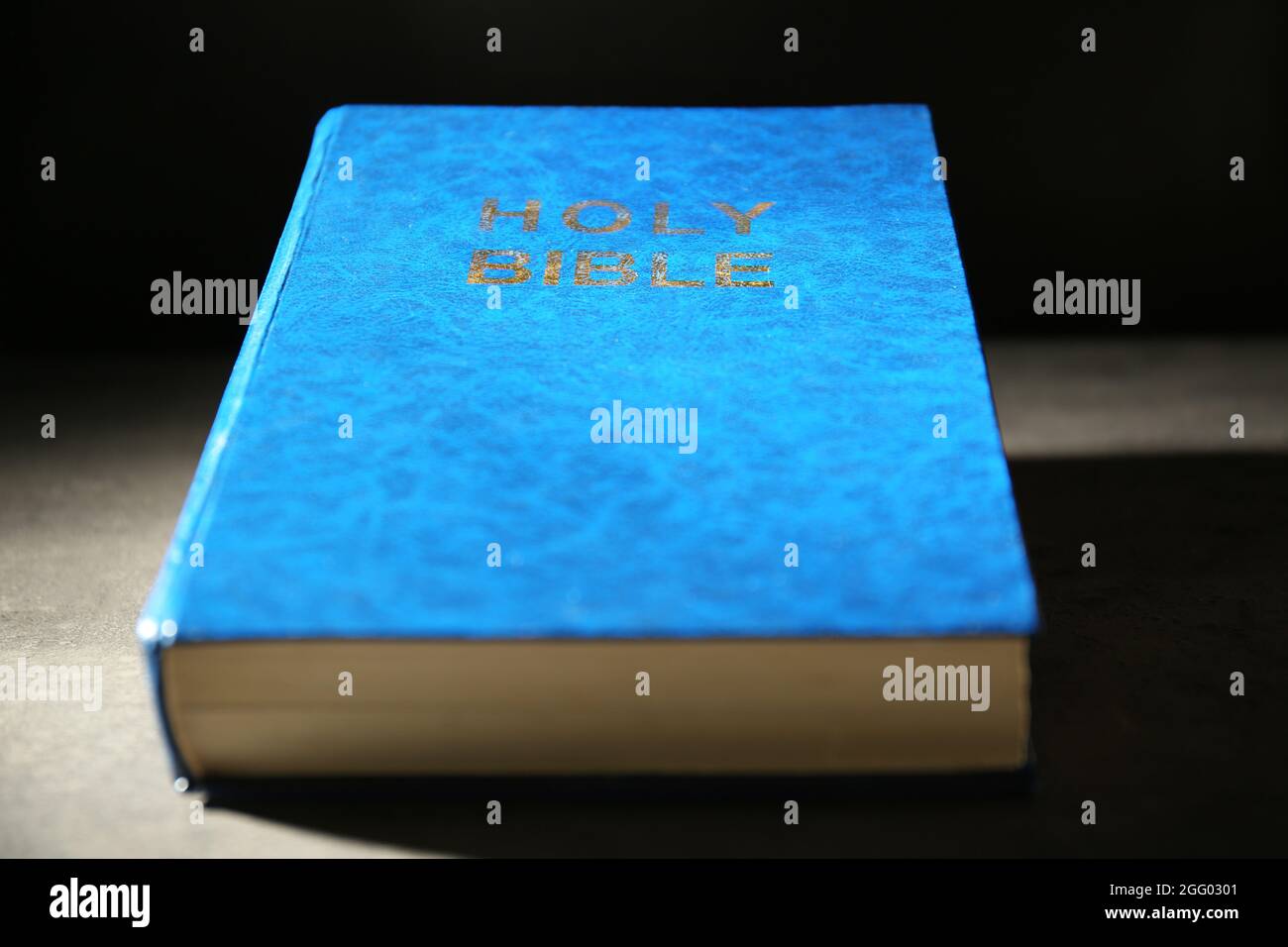 Holy Bible on dark background Stock Photo - Alamy