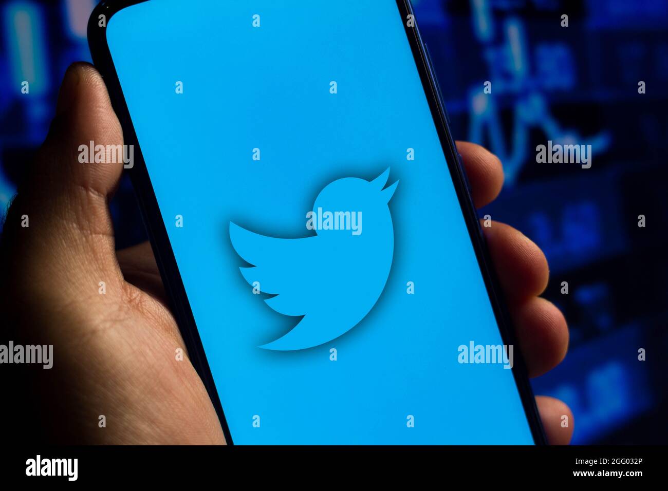 In this photo illustration the Twitter logo seen displayed on a ...