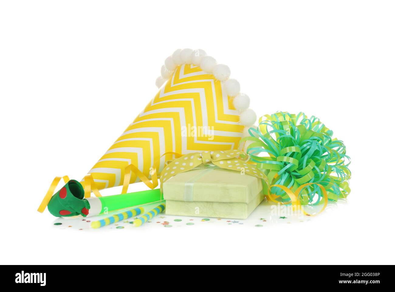 Party hat and colorful confetti on white background Stock Photo - Alamy