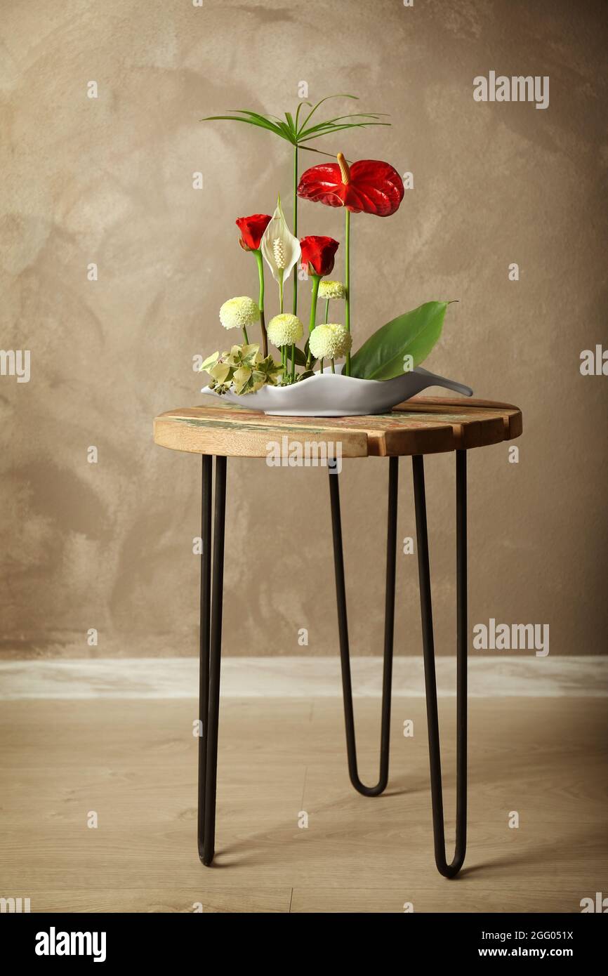 Flower arrangement on a color background Stock Photo - Alamy