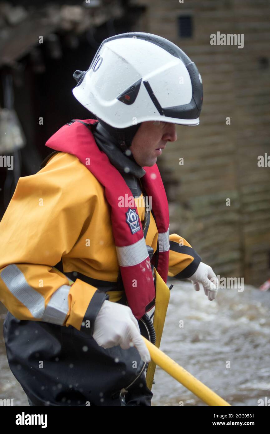 Firefighter flood floods climate change hi-res stock photography and ...