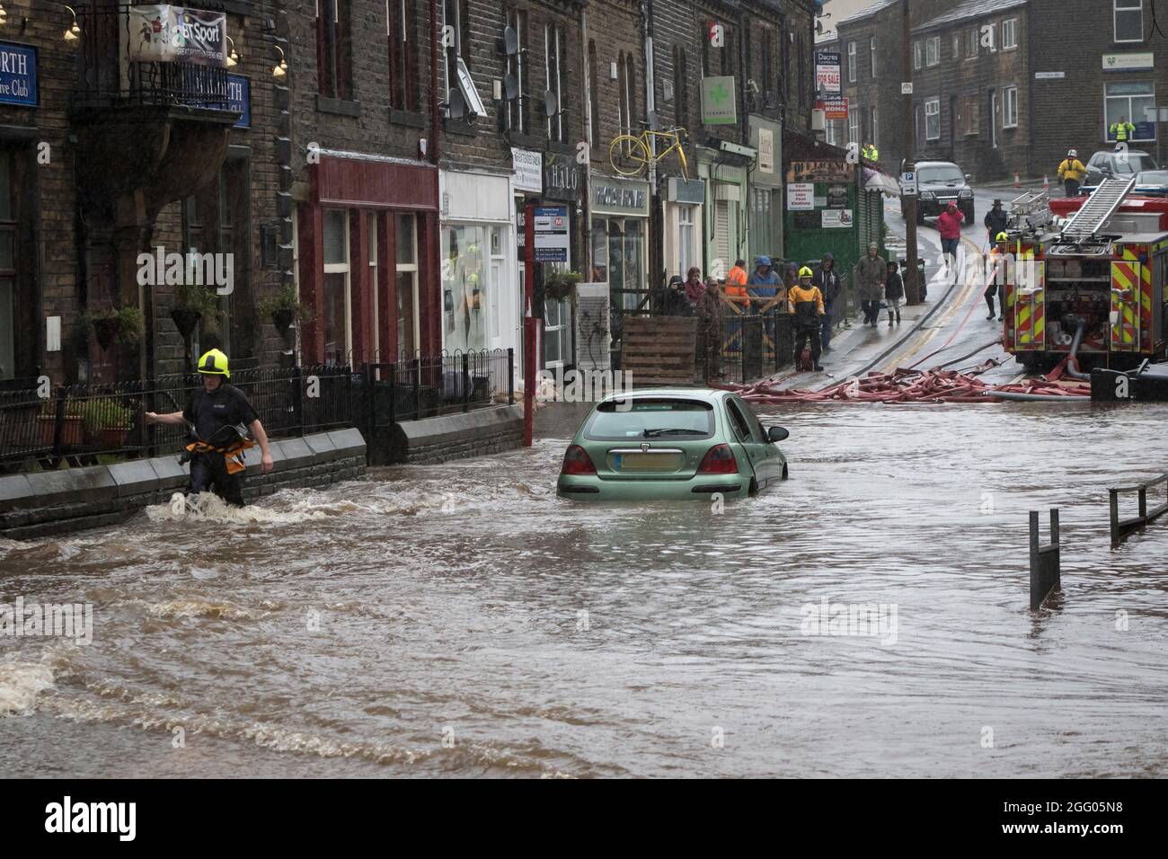 Firefighter flood floods climate change hi-res stock photography and ...