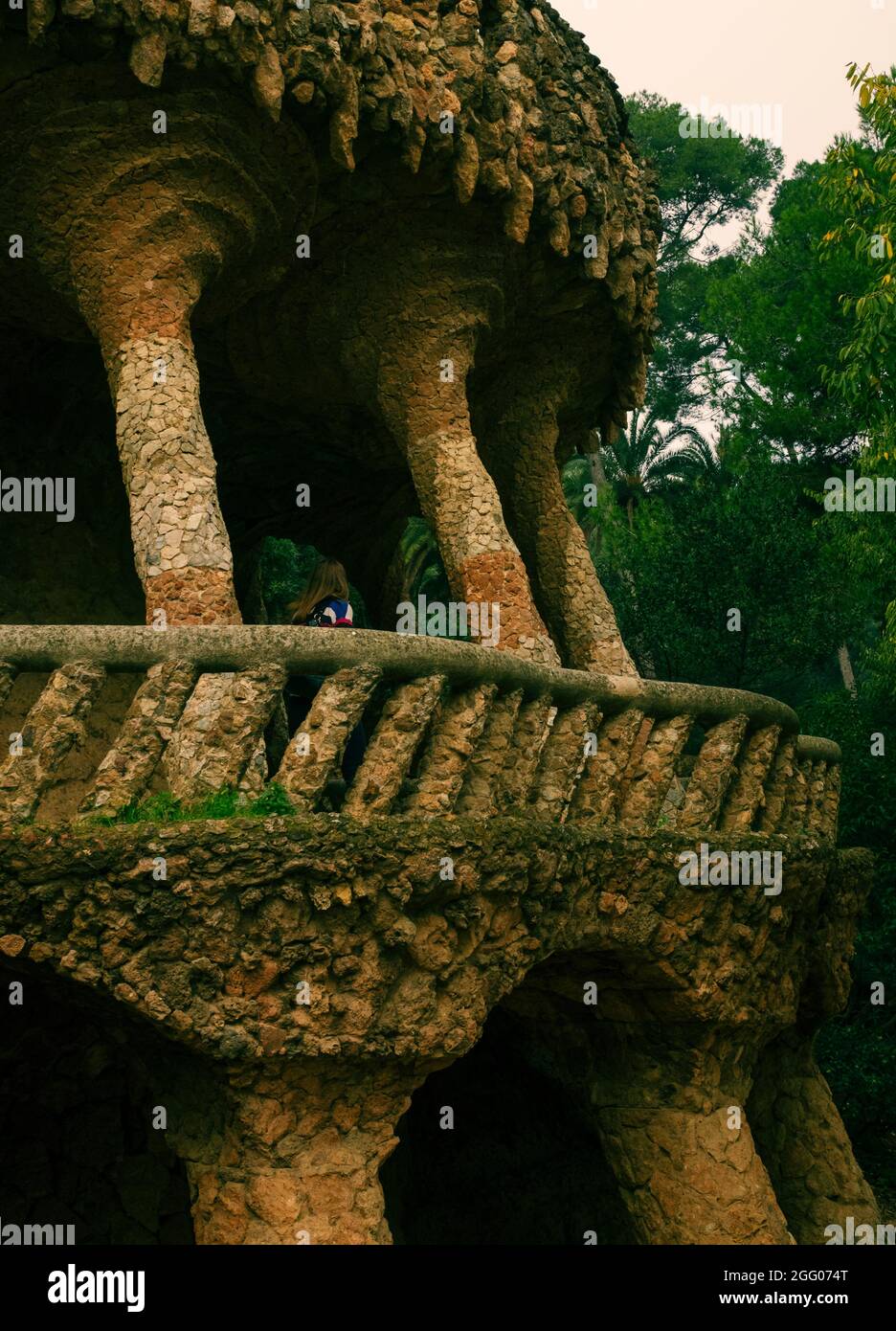 Unique designed pathway and stone columns in Parc Guell created by ...