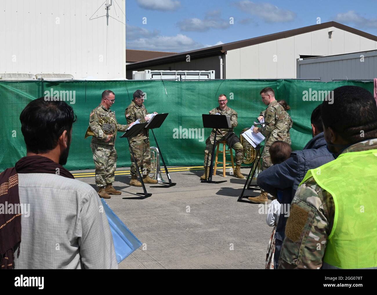 Ramstein Miesenbach, Germany. 24th Aug, 2021. Afghan refugees listens ...