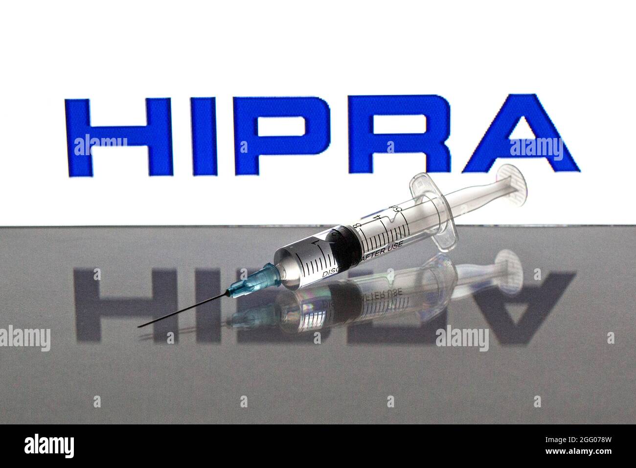 Spain. 26th Aug, 2021. In this photo illustration, a medical syringe ...