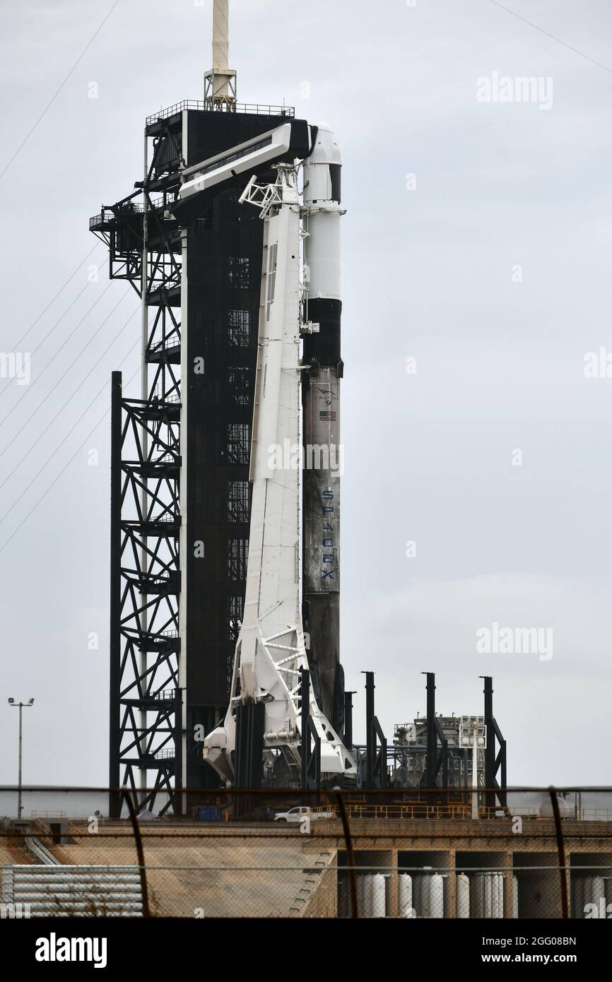 A SpaceX Dragon-2 spacecraft sits on the Falcon 9 rocket as it is ...