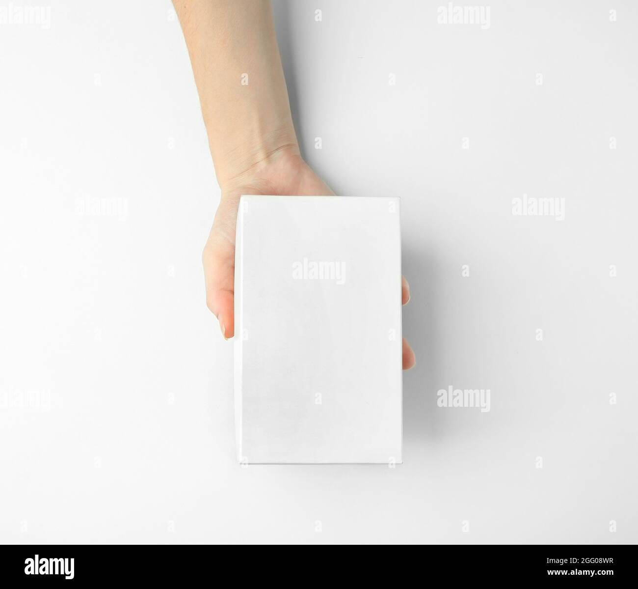 Female hand with box on white background Stock Photo - Alamy