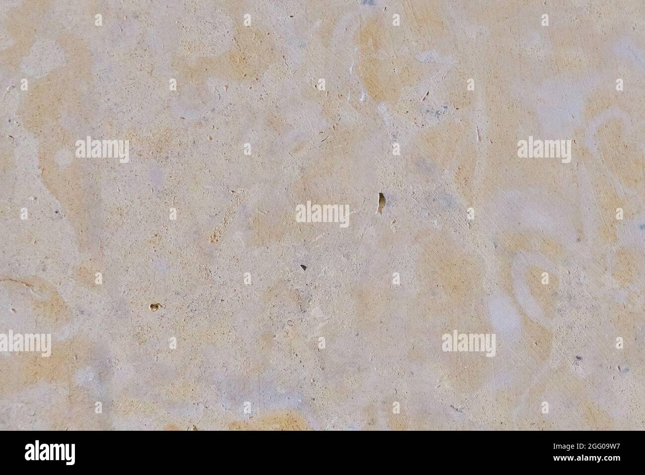 Background of porous limestone stone of orange color. Orange tone stone ...