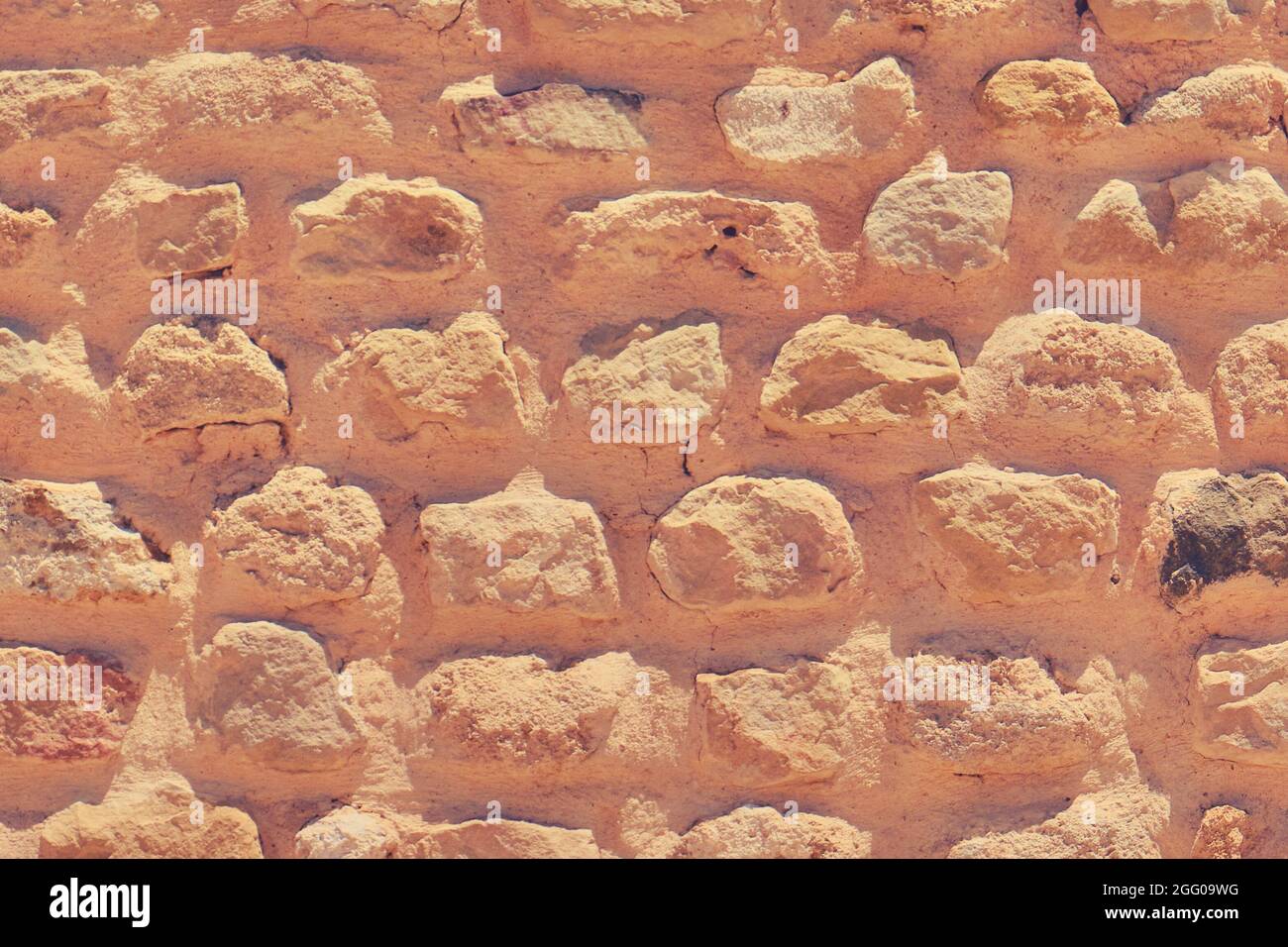 Background of retro sandstone brickwork. The wall at the excavations of ...