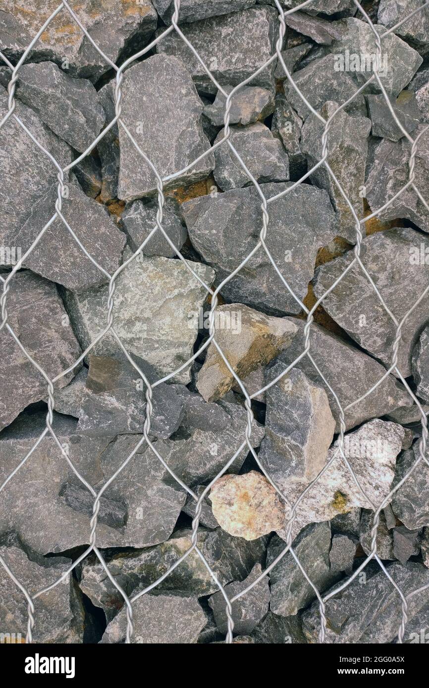 Background of a stone wall of large boulders with a fortification from ...