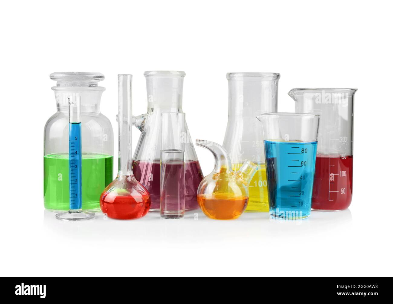 Different chemical glassware with color water on white background Stock ...