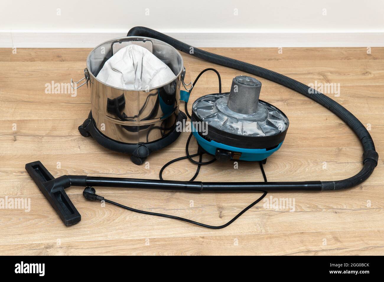 Opened construction vacuum cleaner on the floor Stock Photo - Alamy