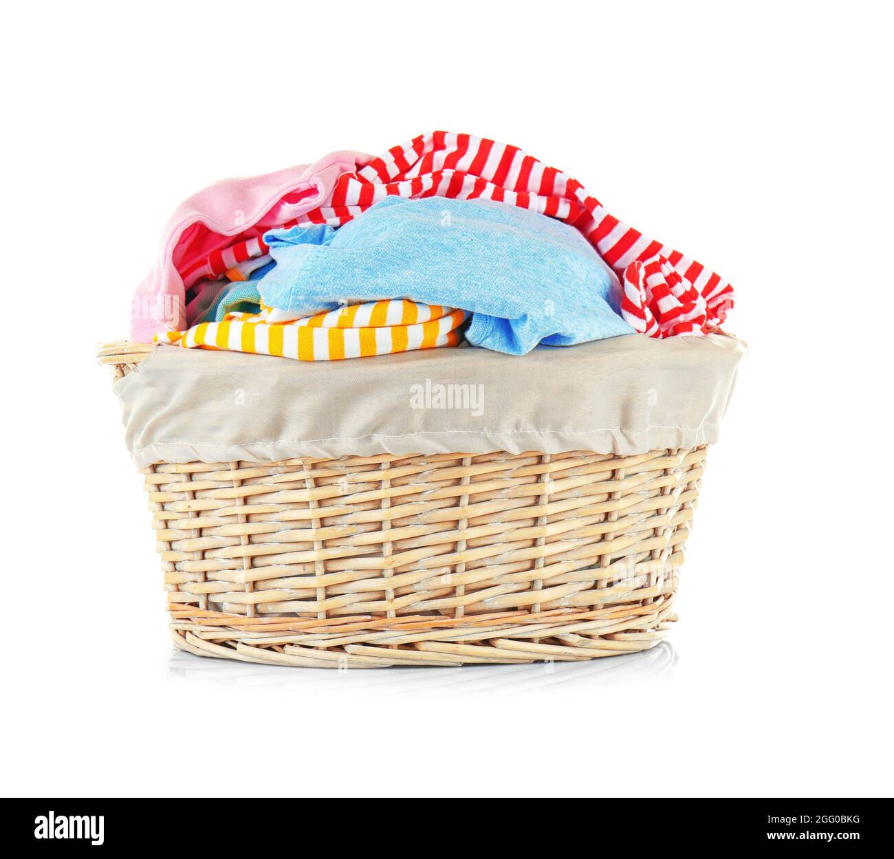 Clothes in wicker basket on white background Stock Photo - Alamy