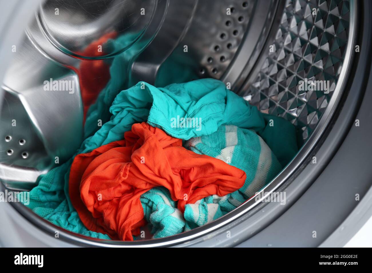 Clothes in washing machine, close up Stock Photo - Alamy