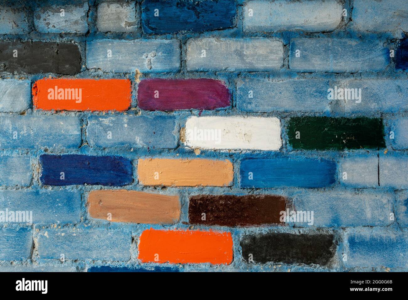 Rainbow colourful brick wall background. brick wall texture with ...