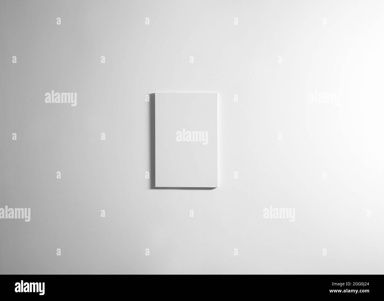 Empty canvas on white wall background Stock Photo - Alamy