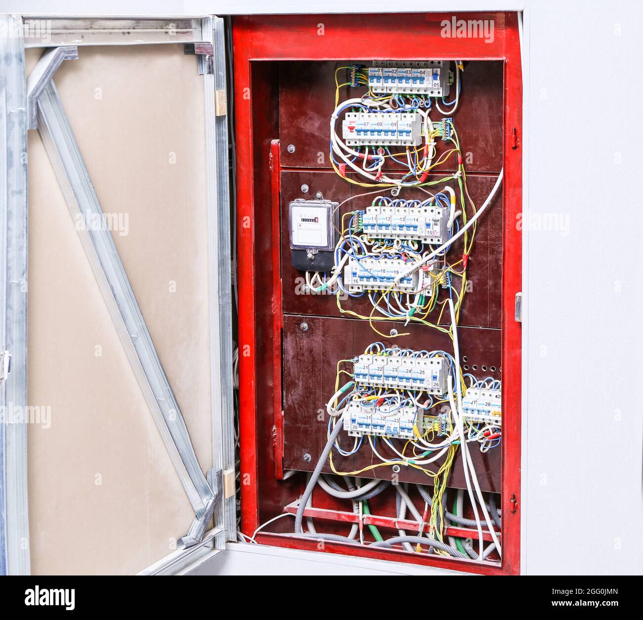 Open distribution board integrated in wall Stock Photo - Alamy