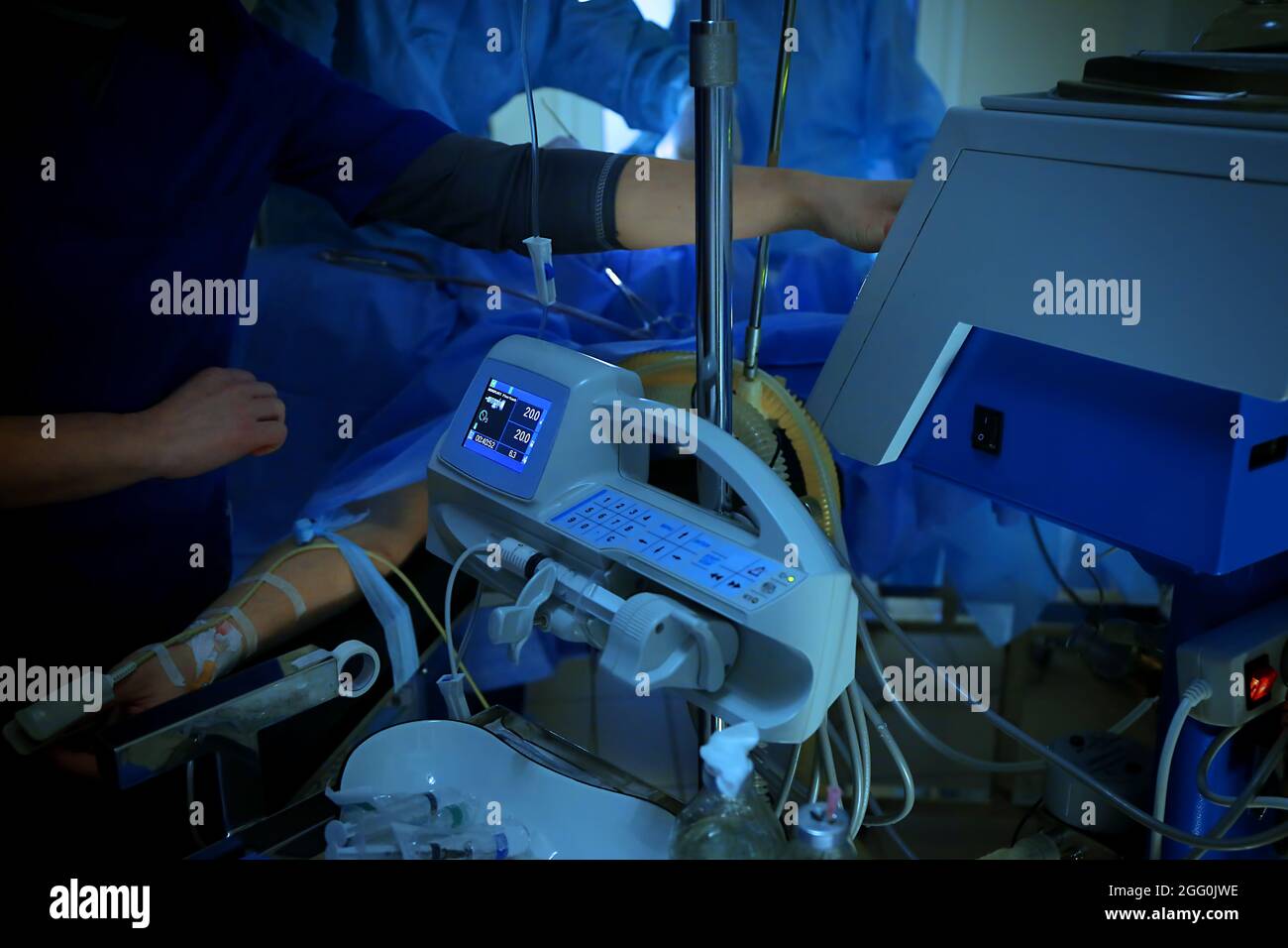 Using of controlled syringe pump during operation in clinic Stock Photo ...