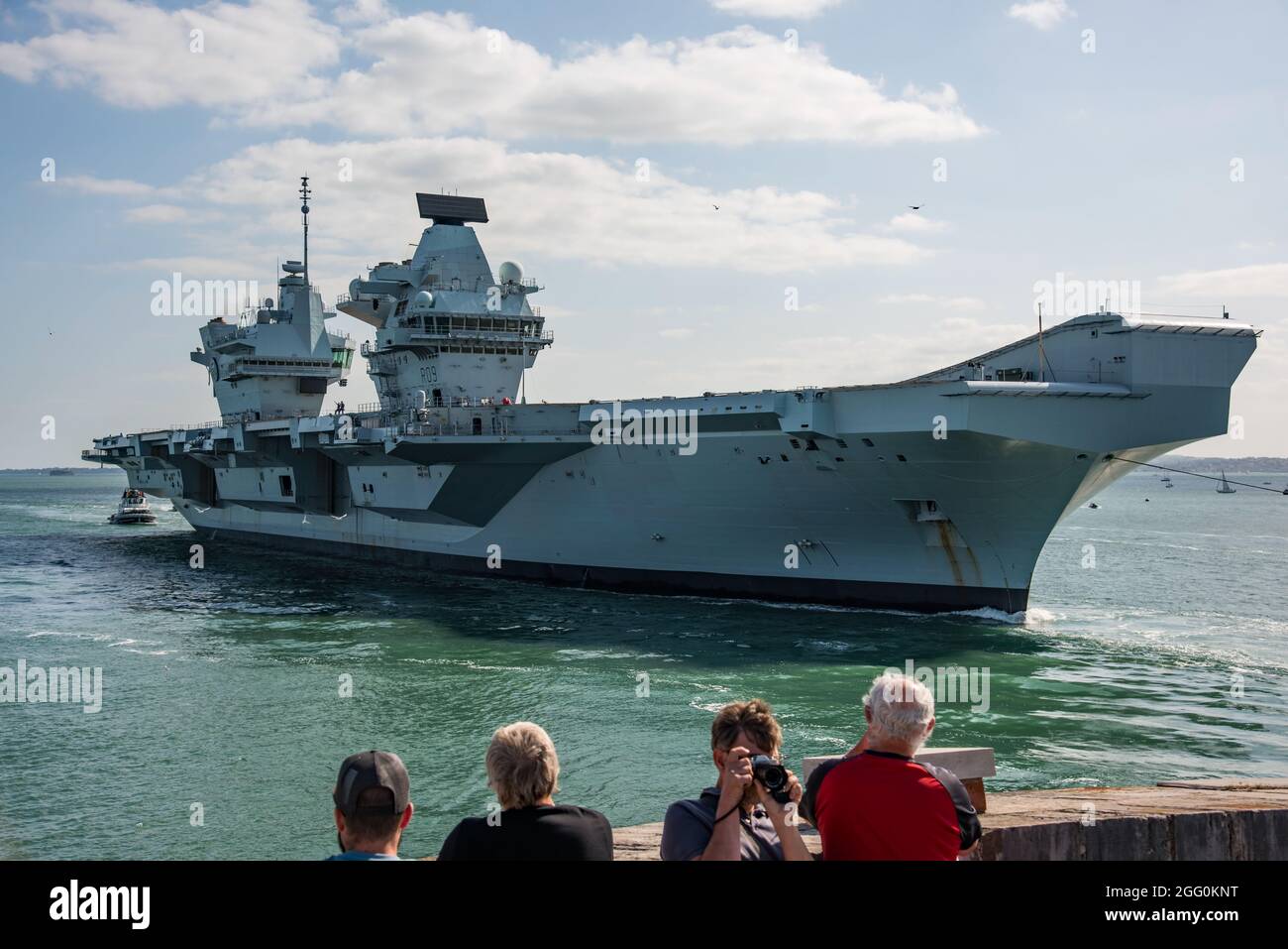 People watching from the Round Tower as the aircraft carrier HMS Prince ...