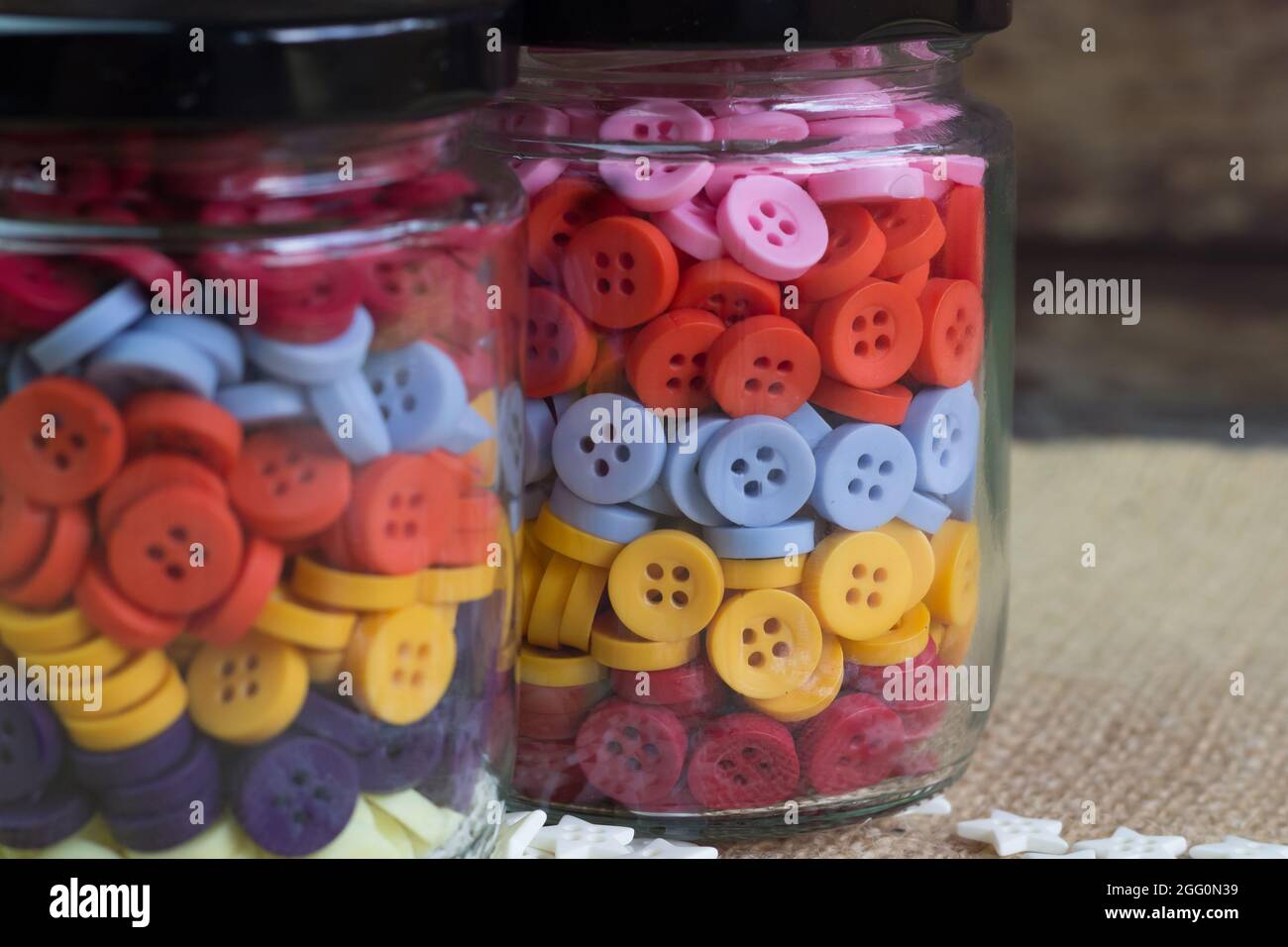 multi color garment buttons in jars for handcraft and art project ...