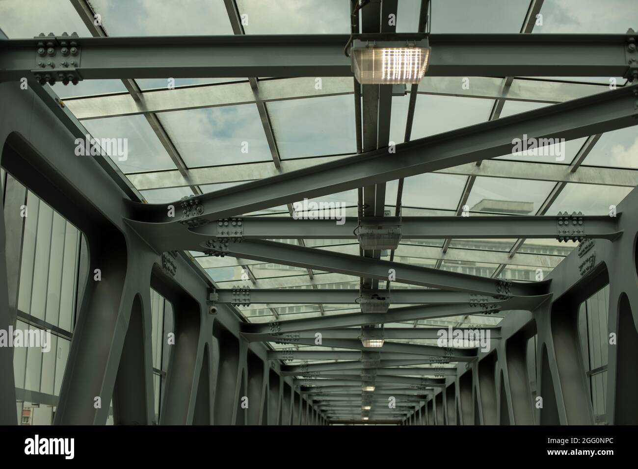 The ceiling of the tunnel is made of iron beams. Modern architecture of ...