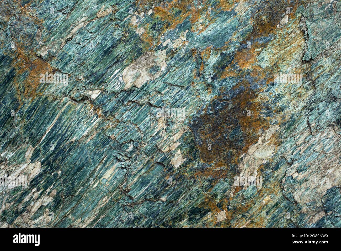 Green stone texture. The surface of the rock. Rock in detail. The ...