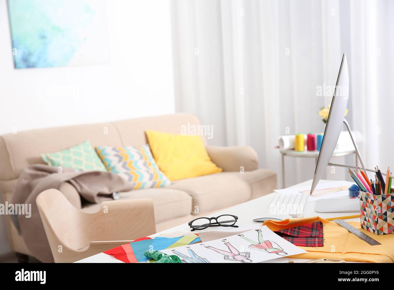 Modern interior of fashion designer workplace Stock Photo - Alamy