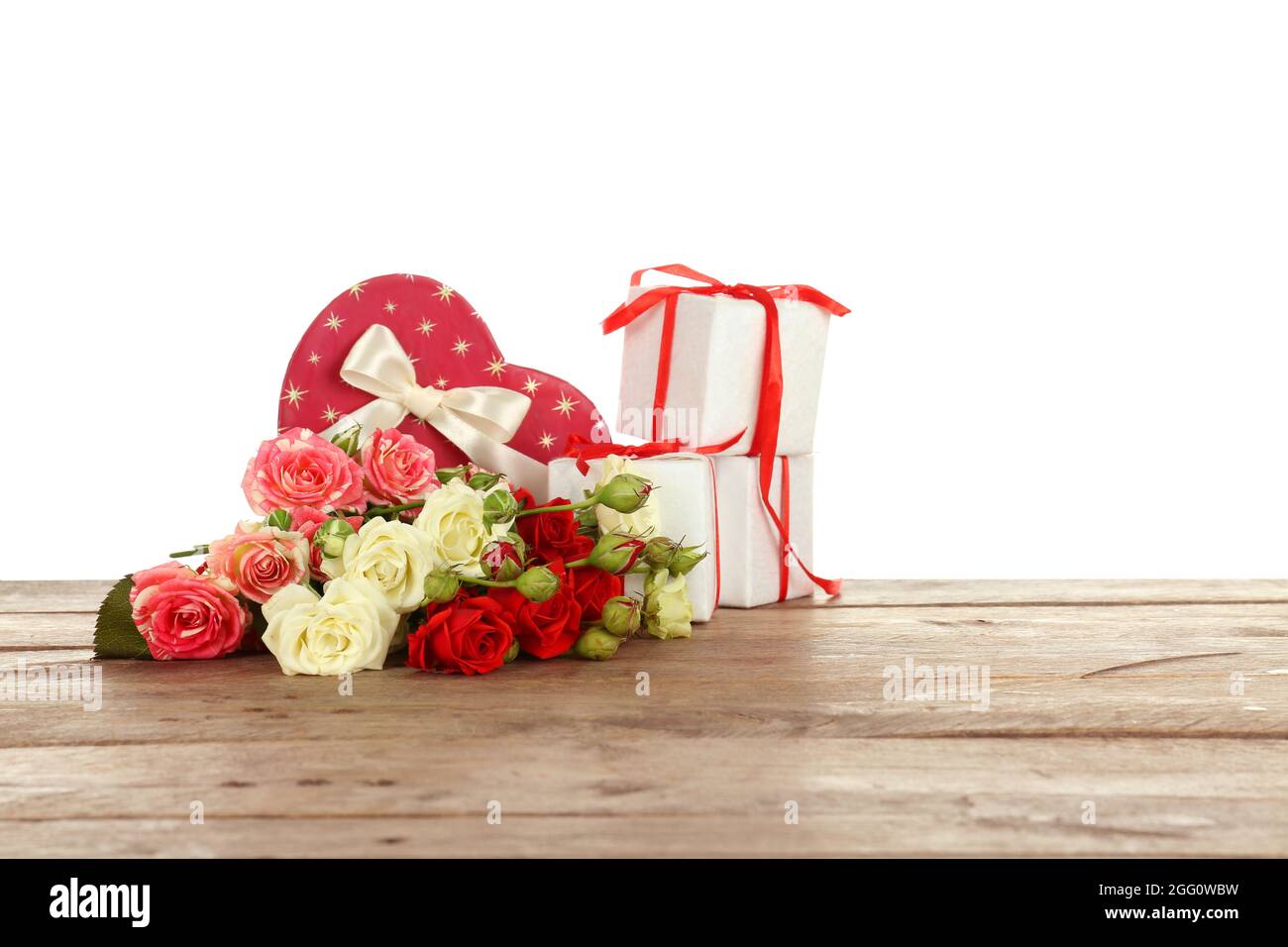 Gift boxes with flowers on white background Stock Photo - Alamy