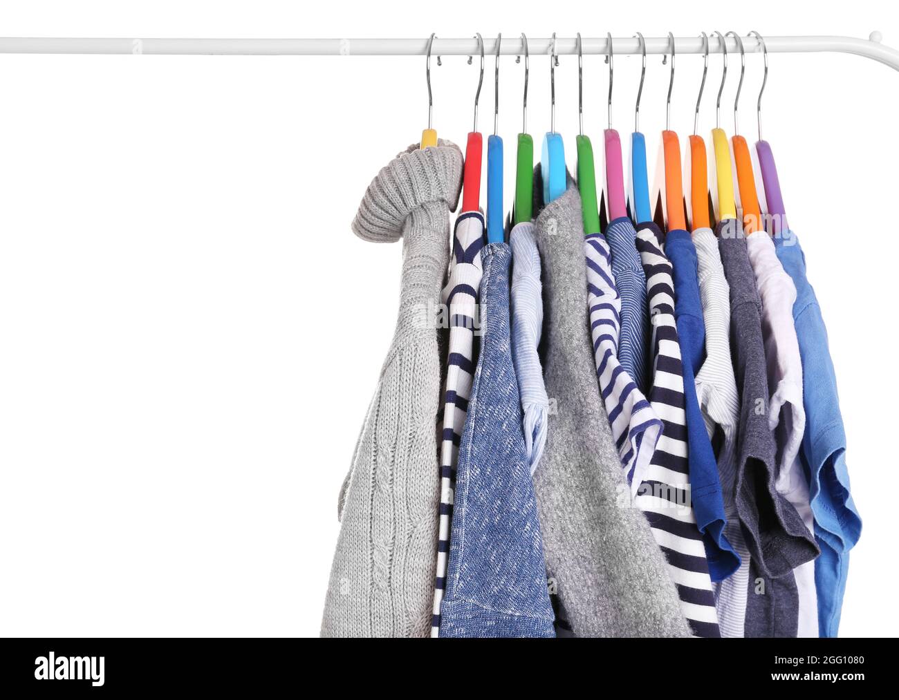 Clothes on hangers on white background Stock Photo - Alamy