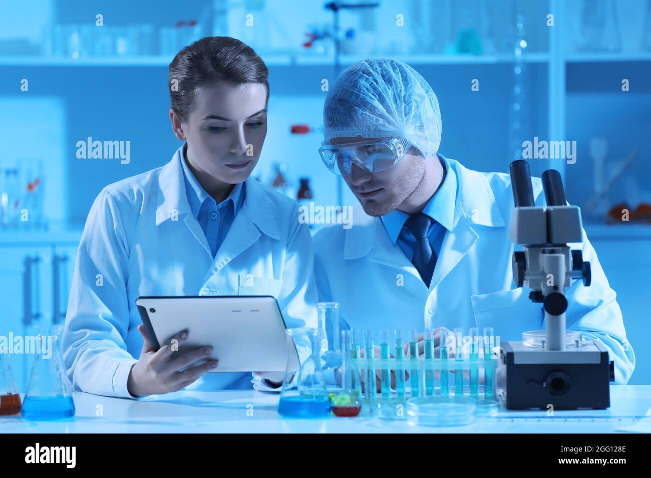 Scientists working in a laboratory Stock Photo - Alamy