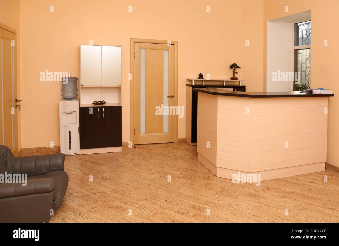 Reception desk in modern clinic Stock Photo - Alamy