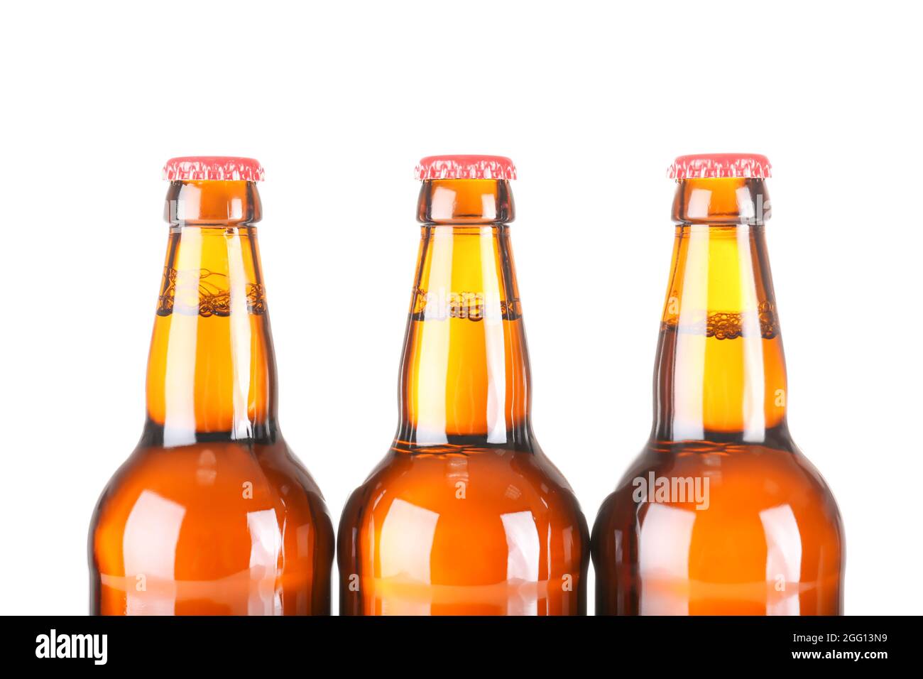Beer bottles in a row isolated on white Stock Photo - Alamy