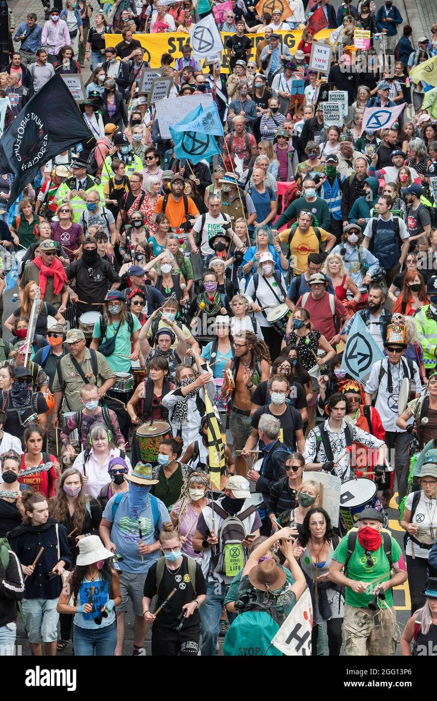 London, UK. 27th Aug, 2021. Rebels with flags drums and signs march ...