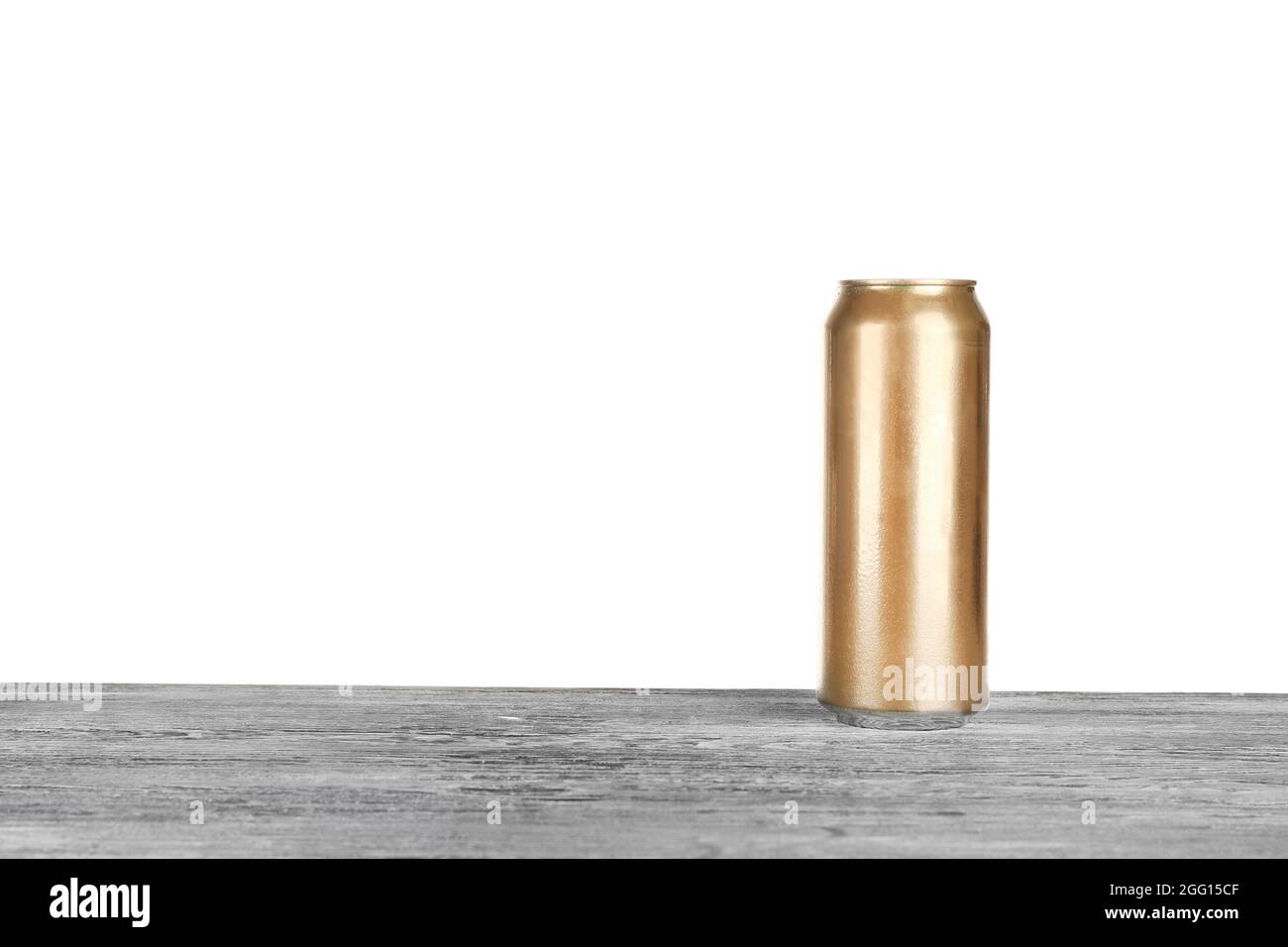 Can of beer on table against white background Stock Photo - Alamy