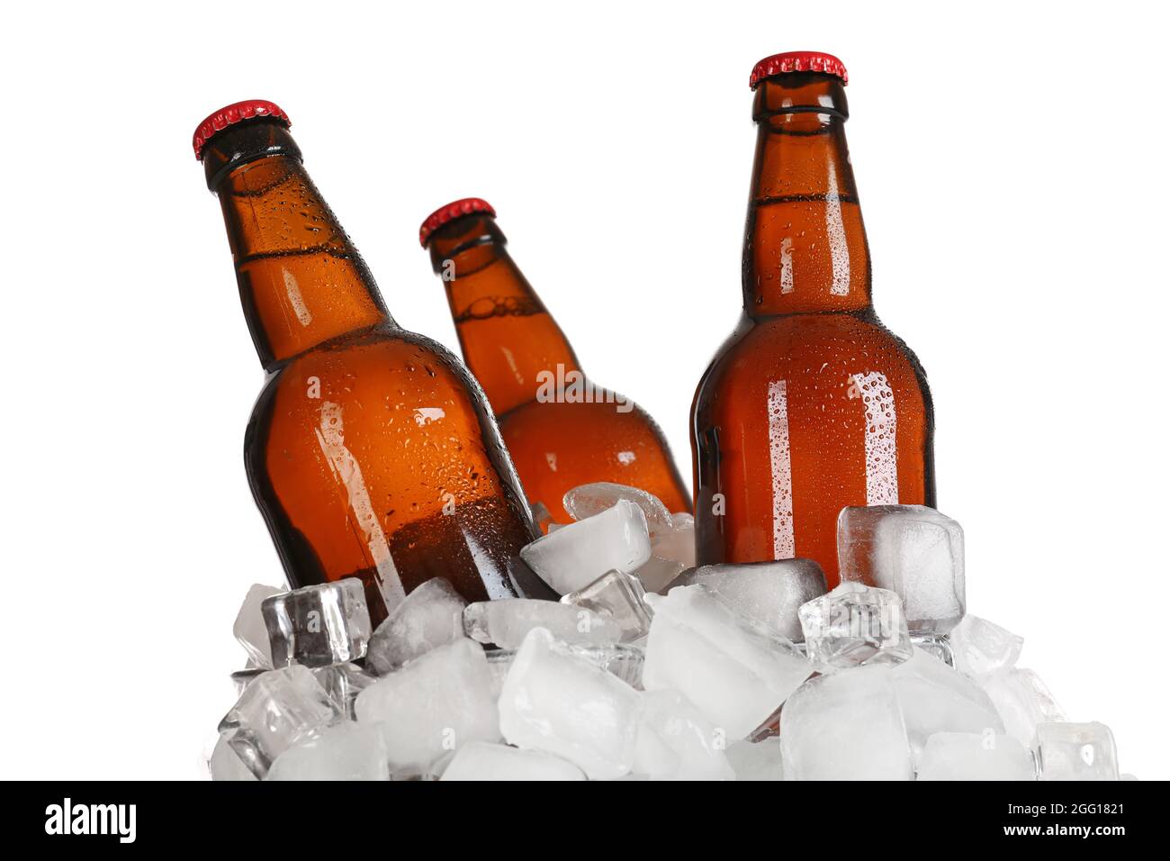 Bottles of beer in ice on white background Stock Photo - Alamy