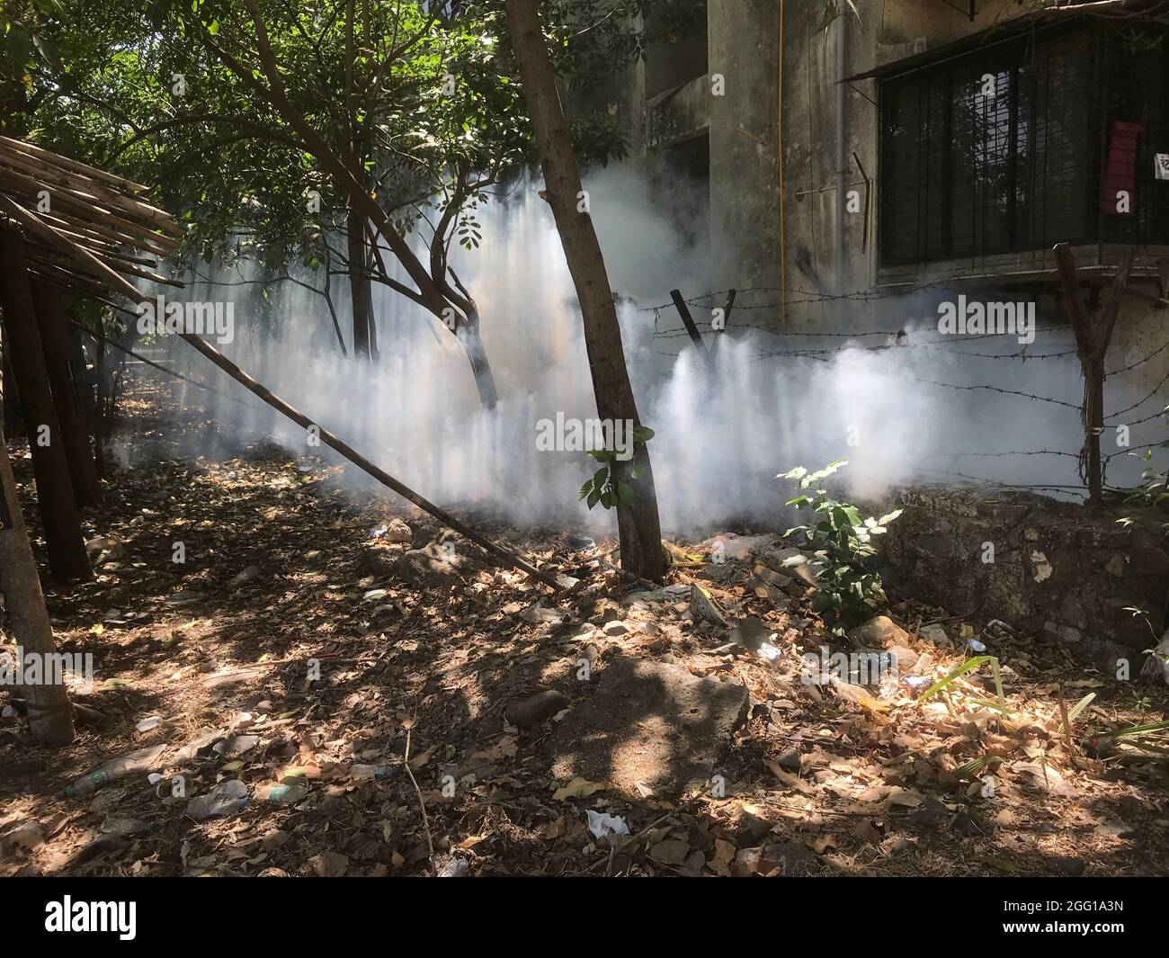 Mumbai , India - 31 March 2021, White smoke against the morning ...